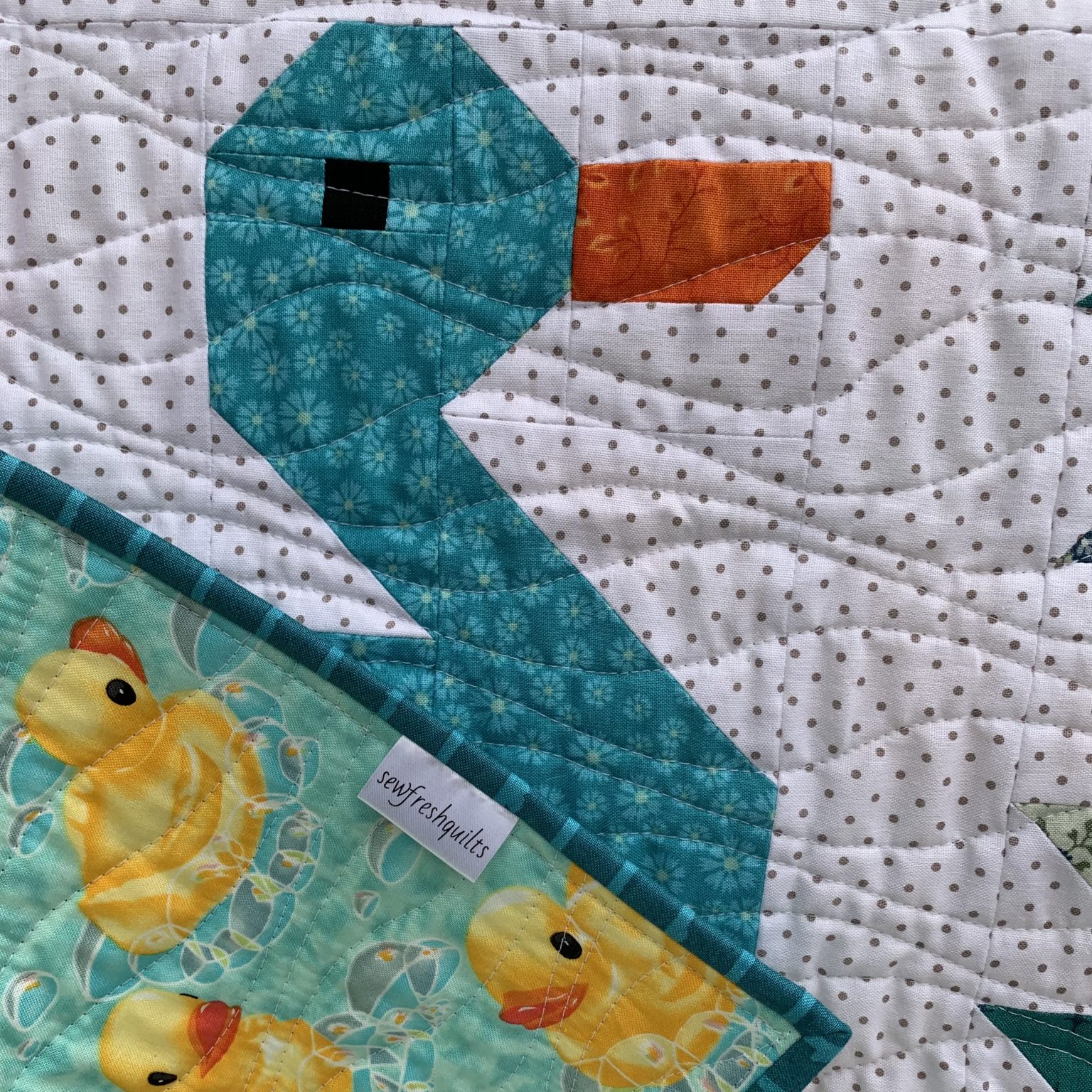Ducks and Ducklings quilt finish