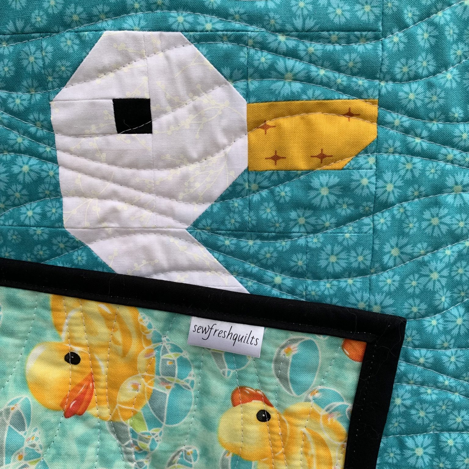 Duck and Duck Tracks quilt finish